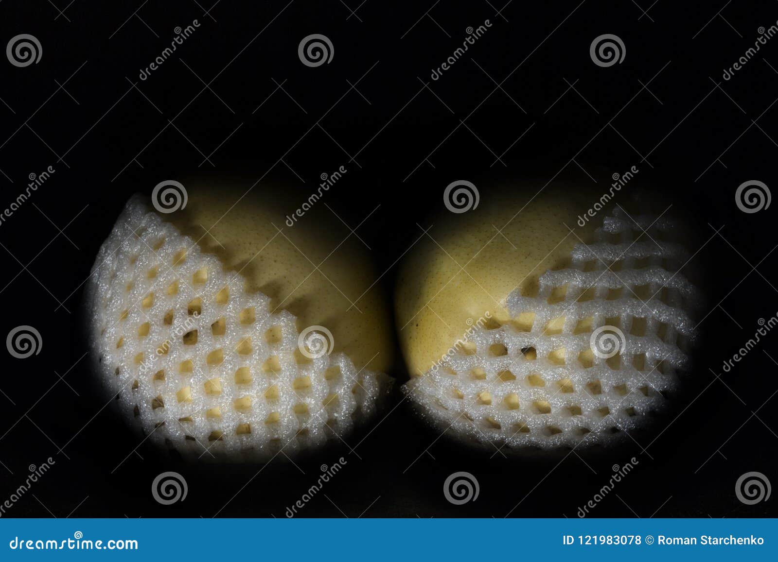 Composition of Two Yellows Pears in White Openwork Shell As a Breast in ...