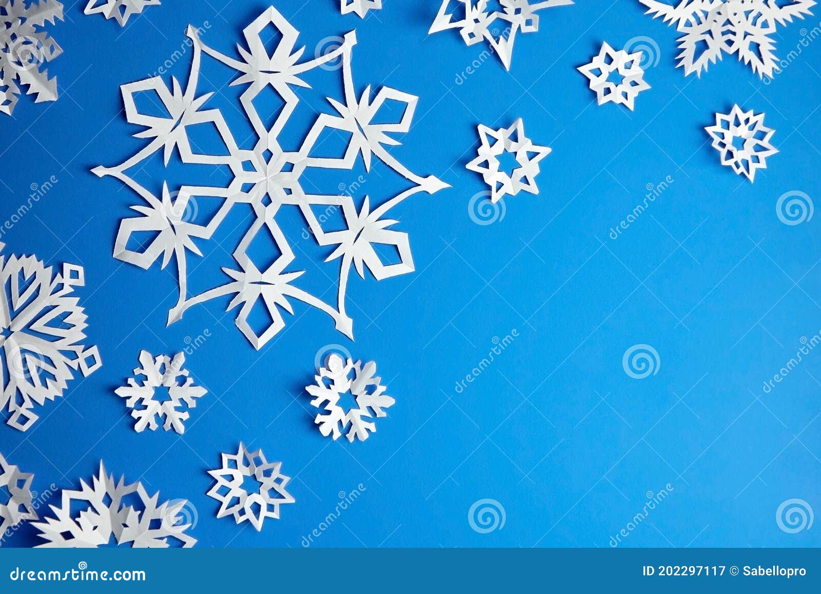 Composition with Paper Snowflakes on Blue Background Stock Image ...