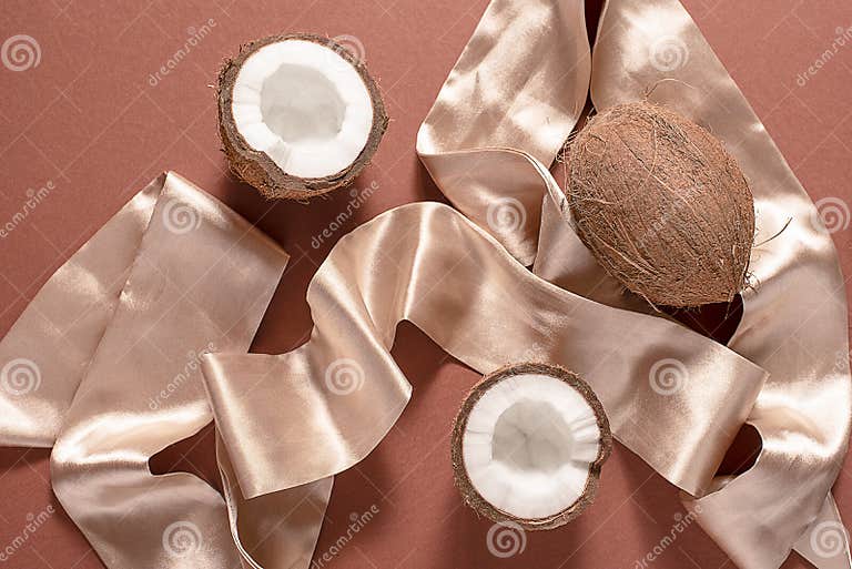Composition of Whole and Broken Coconuts and Ribbons Stock Photo ...