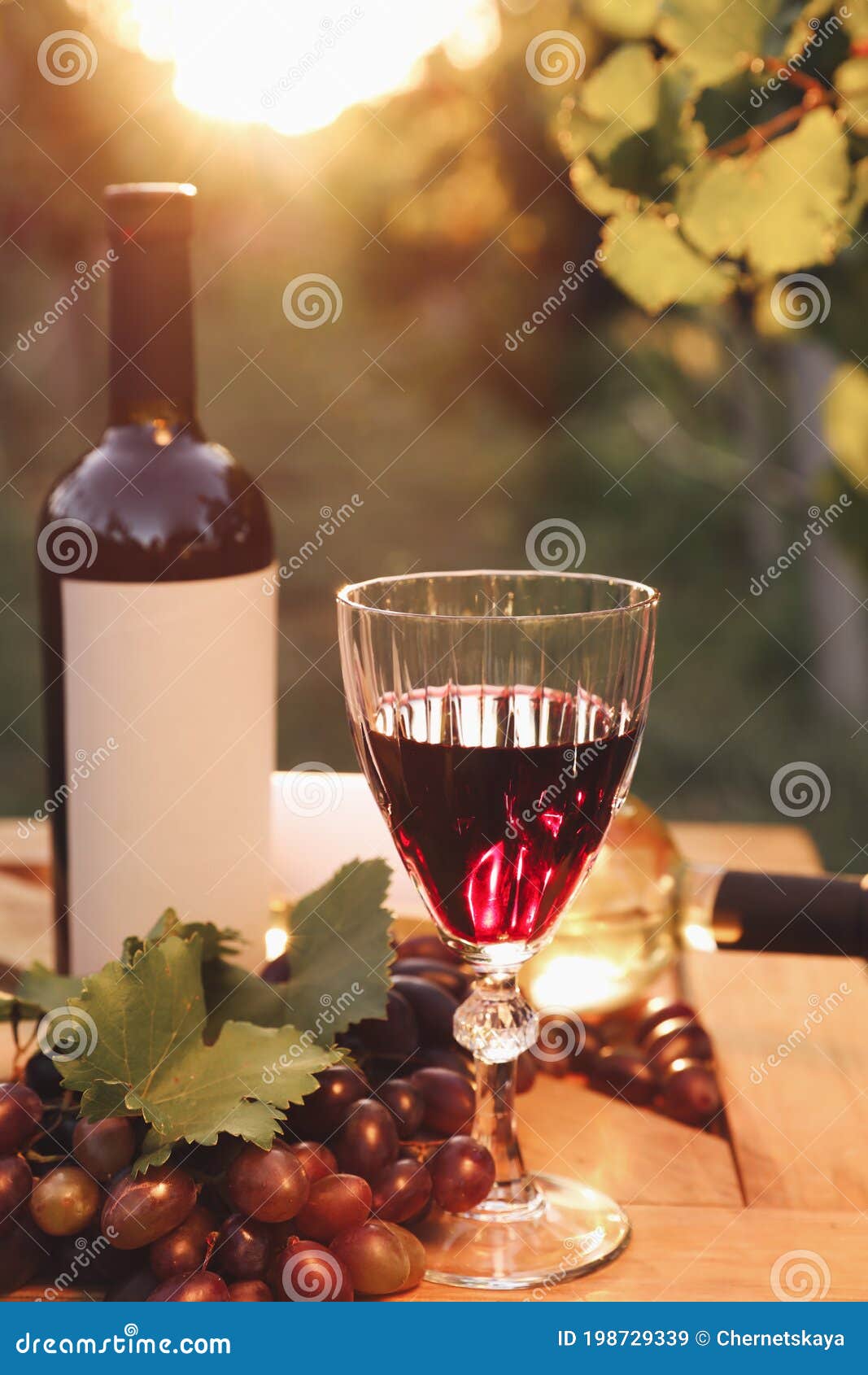 Composition with Wine and Ripe Grapes on Wooden Table Stock Image ...