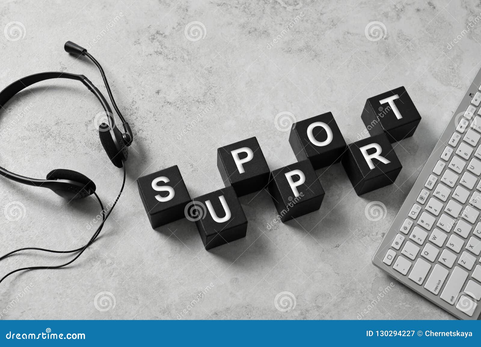 Composition with Word SUPPORT, Headset and Keyboard on Grey Background ...