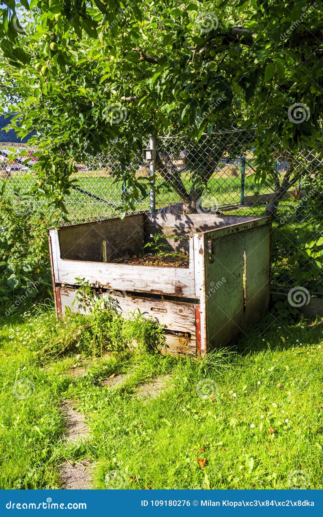 Composting in the Garden Under the Tree. Stock Photo - Image of ...