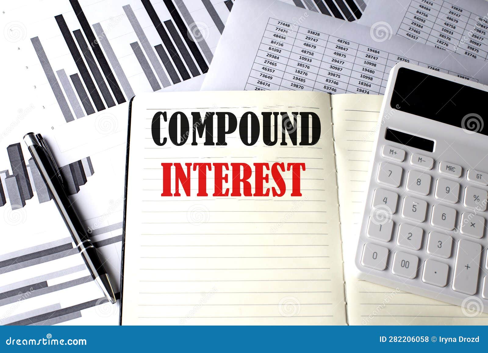 COMPOUND INTEREST Text Written on a Notebook on Chart and Diagram Stock ...
