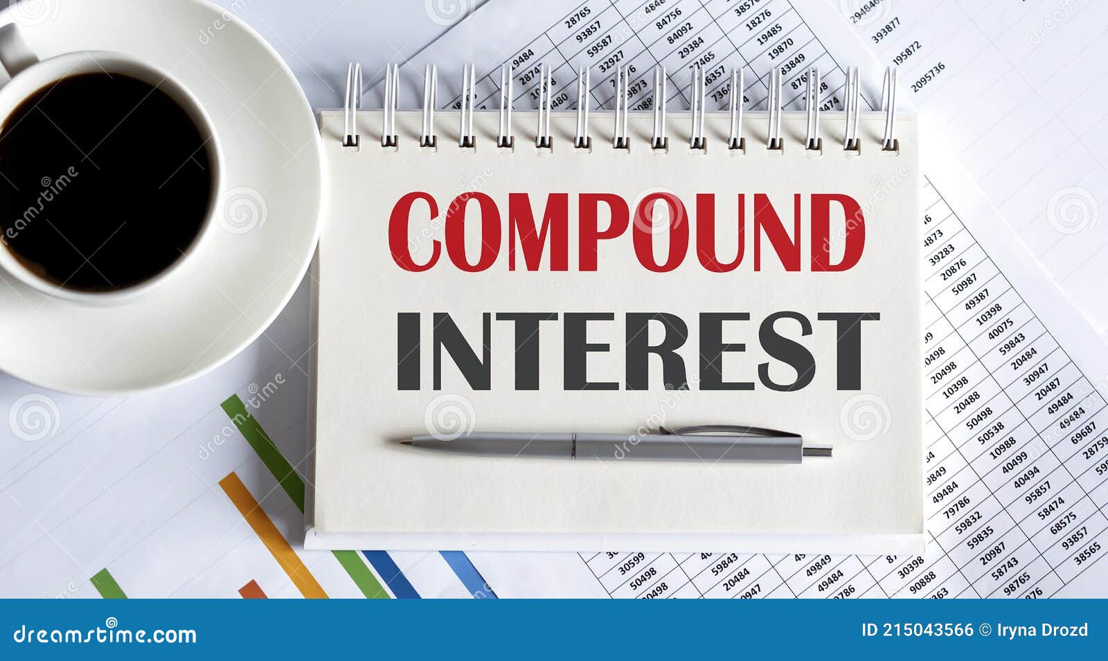 COMPOUND INTEREST Text Written on a Notebook with Pen and Chart Stock ...