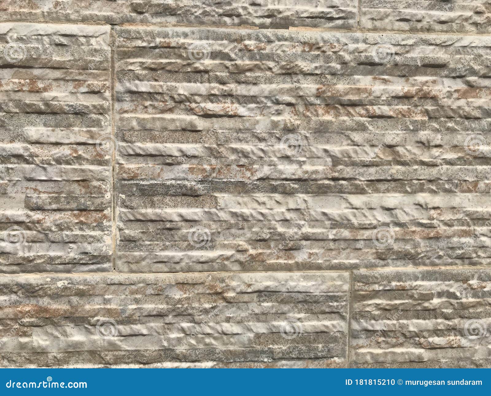 Stone Pitching For Wall Finishes Of Compound Wall Of An Residential ...