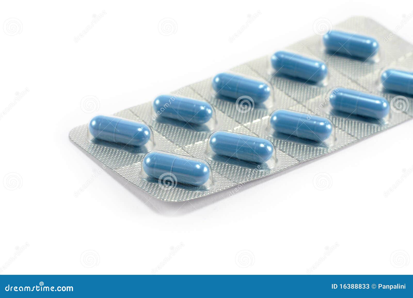 Comprimidos azuis imagem de stock. Imagem de vitaminas - 16388833