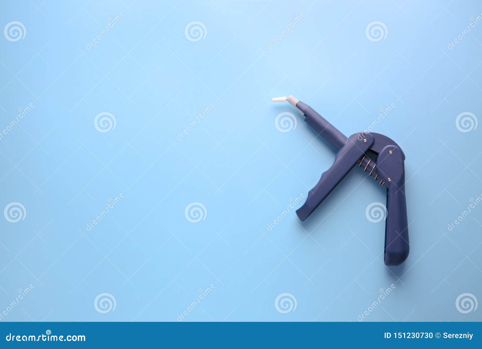 Compule Tip Gun on Color Background Stock Photo - Image of background ...