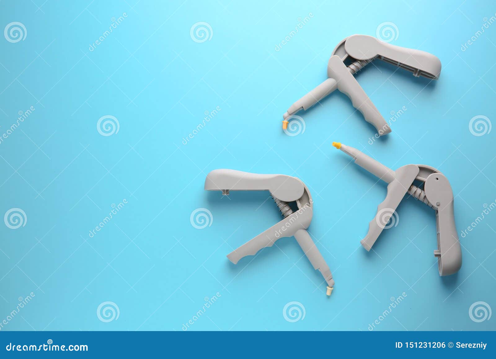 Compule Tip Guns on Color Background Stock Photo - Image of filling ...