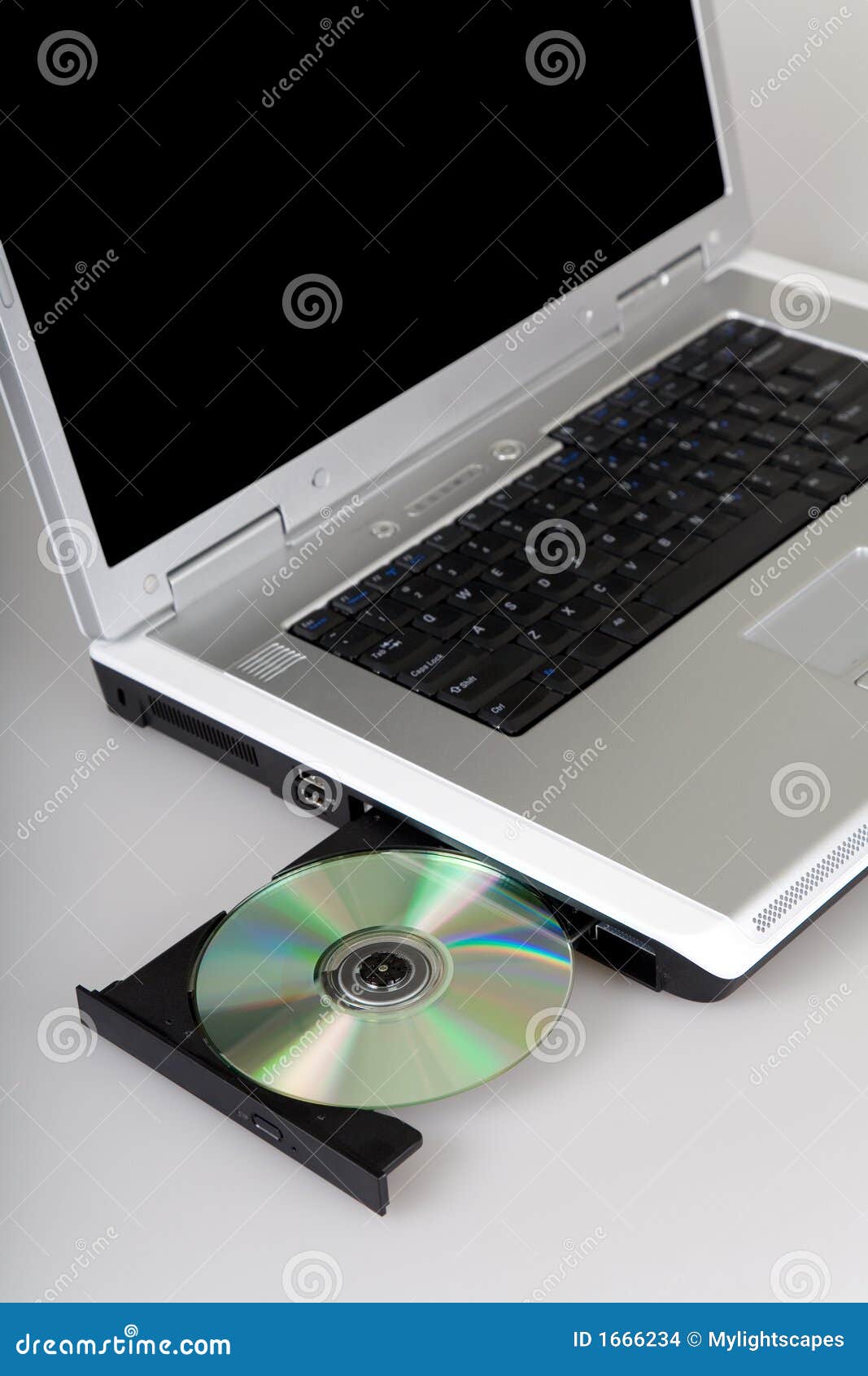 Computadora Portátil Y CD-ROM. Foto de archivo - Imagen de monitor ...