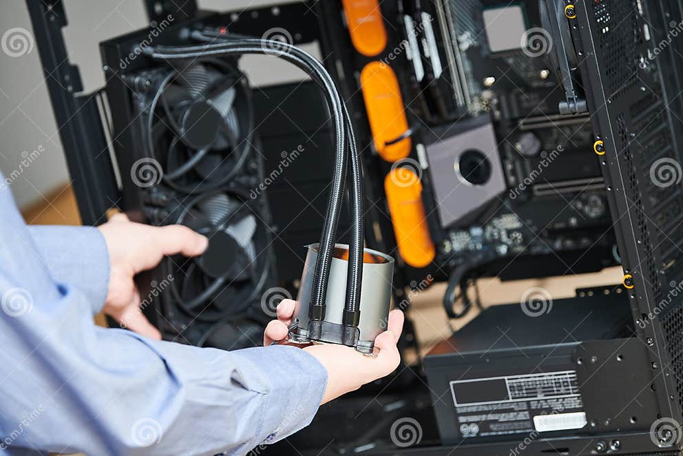 Computer Assembling Service. Serviceman Installing Liquid Cooling ...