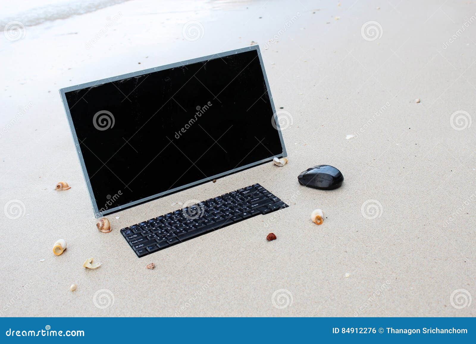 The computer on the beach. stock photo. Image of ocean - 84912276