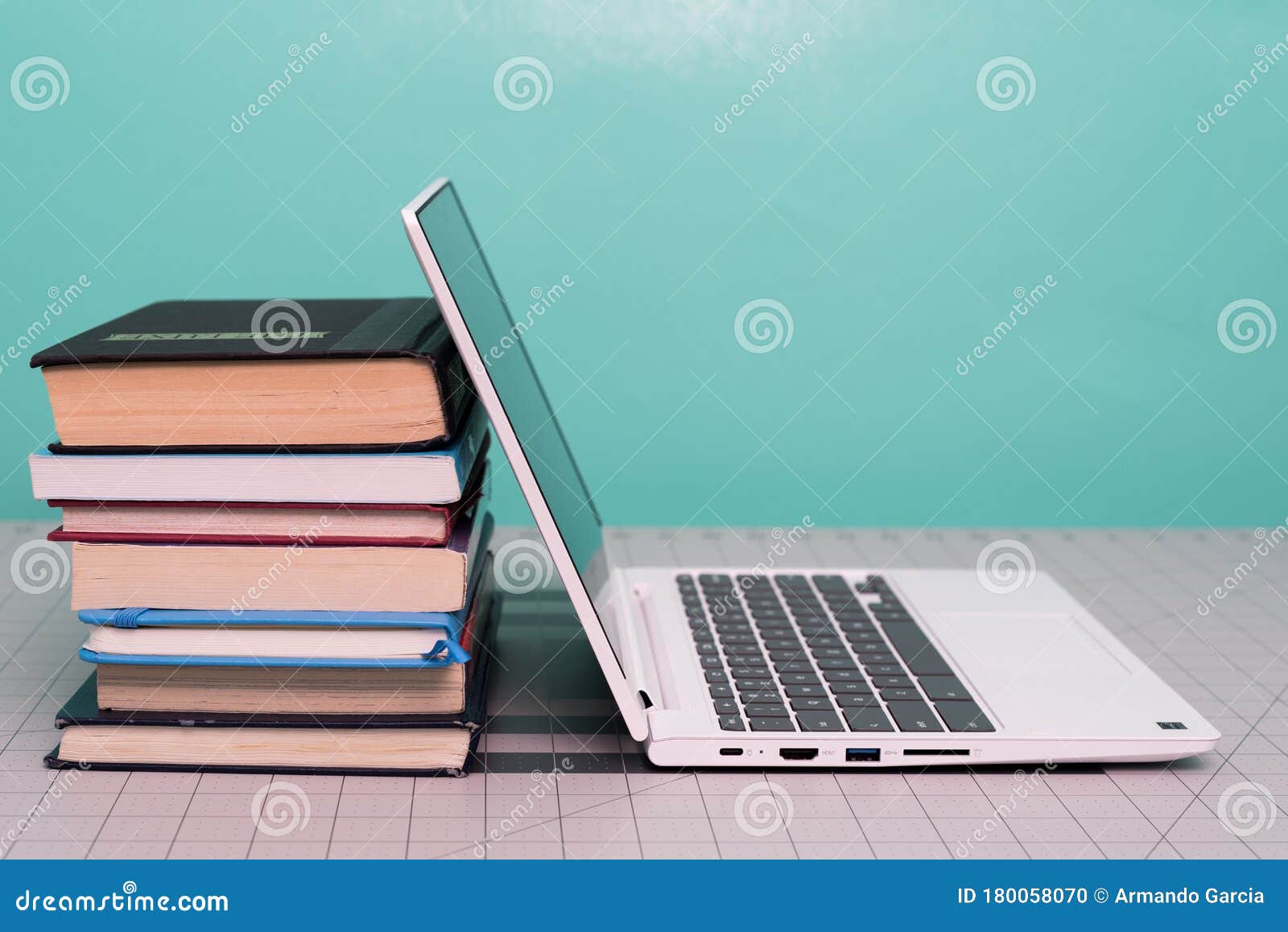 Computer with Books on a Table Station Stock Photo - Image of wifi ...