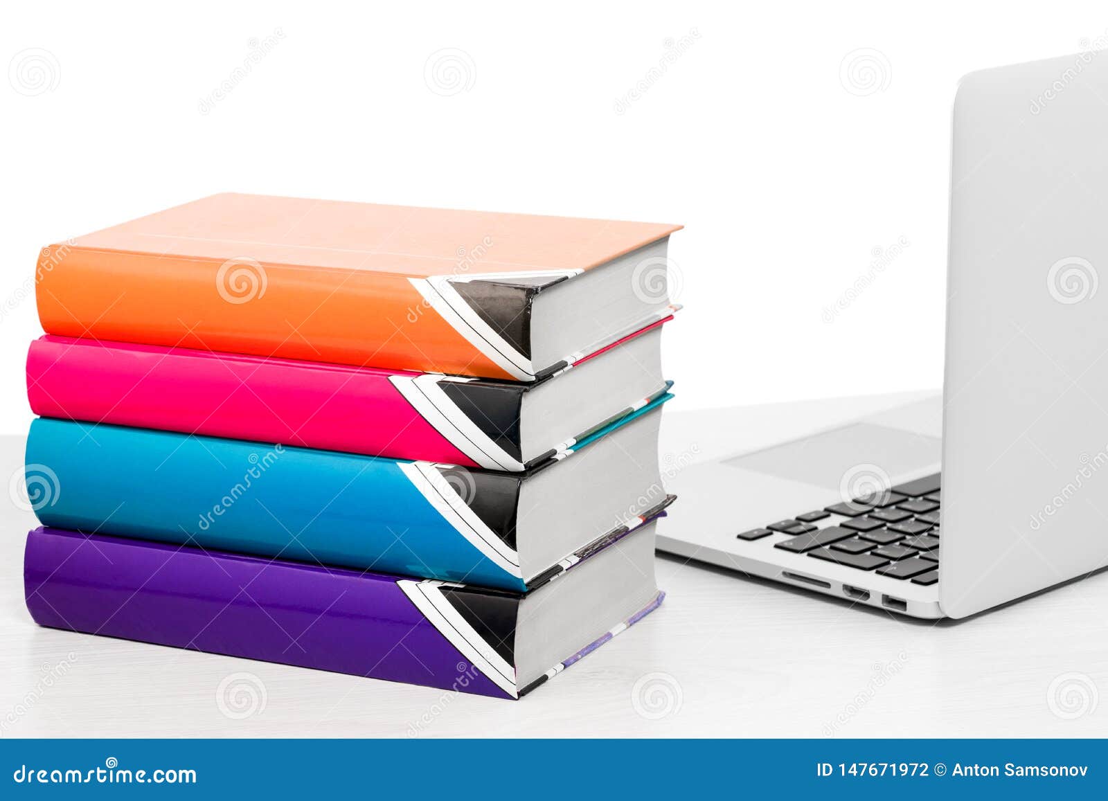 Computer and books stock photo. Image of information - 147671972