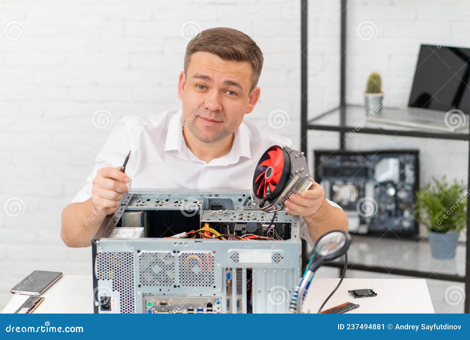 Computer Breakdown. Workshop. Repairman Installs a Cooler in in a ...