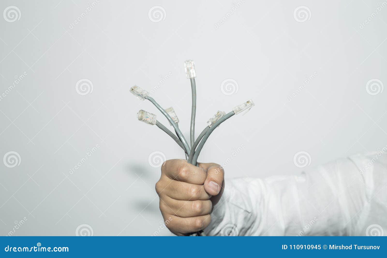 Computer Cables in Hand on White Background. Stock Image - Image of ...