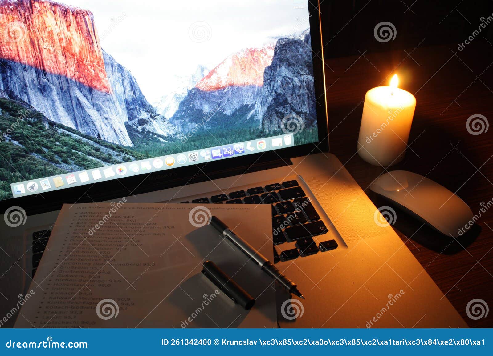 Computer and Candlelight in the Workspace Stock Photo - Image of ...