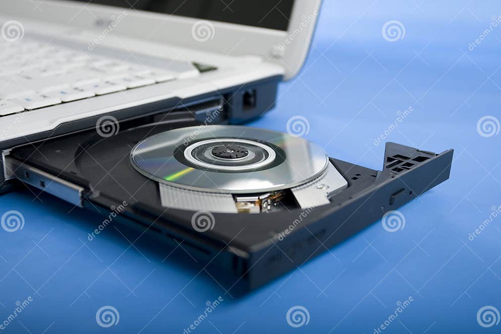 Computer and cd-rom stock image. Image of disk, metallic - 5626265