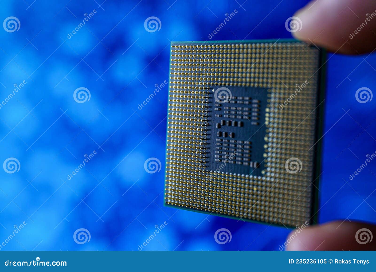 Computer Chip in Hands. a Chipset is a Set of Electronic Component that ...