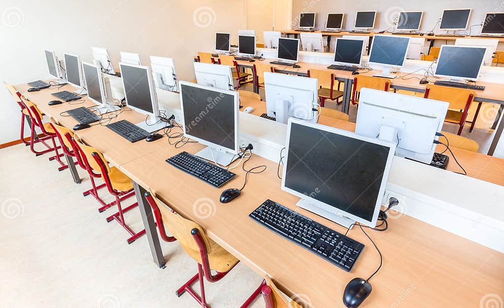 Computer Class with Rows of Desktop Computers in School Stock Photo ...