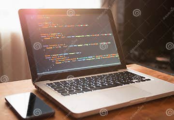 Computer Code on Laptop Web Developing and Cellphone Stock Image ...