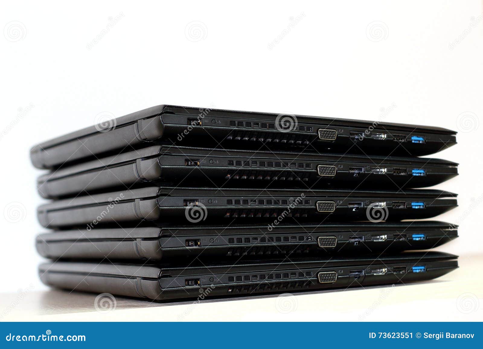 Computer Connection. Folded Stack of Laptops on White Background Stock ...