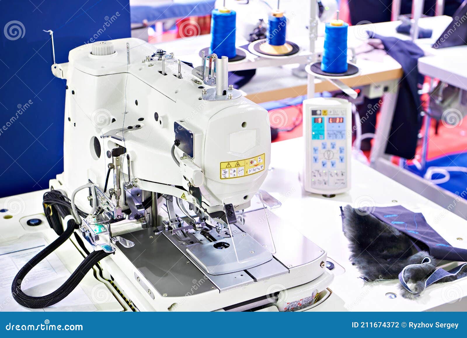 Computer-controlled, Eyelet Buttonholing Machine Stock Photo - Image of ...