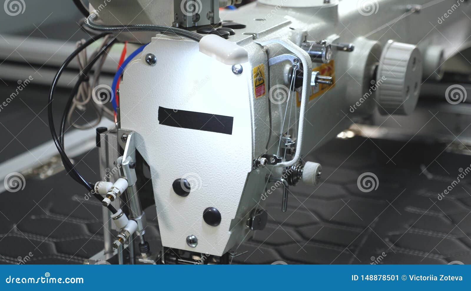 Computer Controls the Sewing Machine. Robotics Works in the Tailoring ...