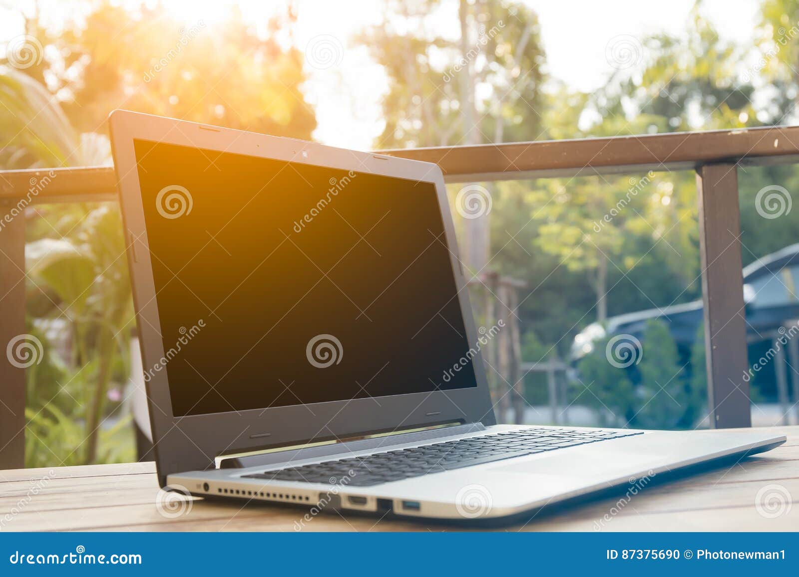 Computer on a Desk in a Sunny Garden. Stock Photo - Image of green ...
