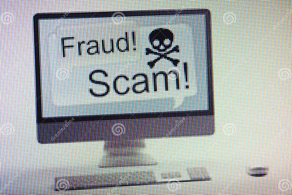 Computer Displaying Internet Fraud and Scam Warning on Screen Stock ...