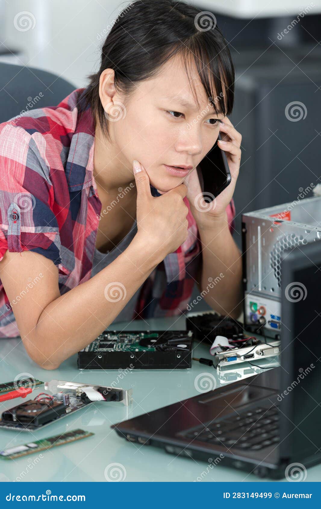 Computer Engineer with Laptop Smartphone and Dismantled Pc Stock Image ...