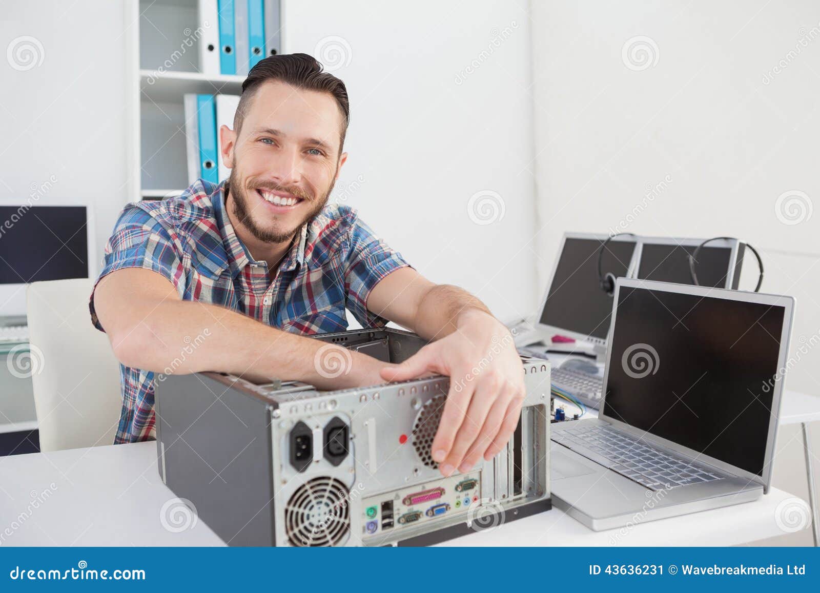 Computer Engineer Smiling at Camera beside Open Console Stock Image ...
