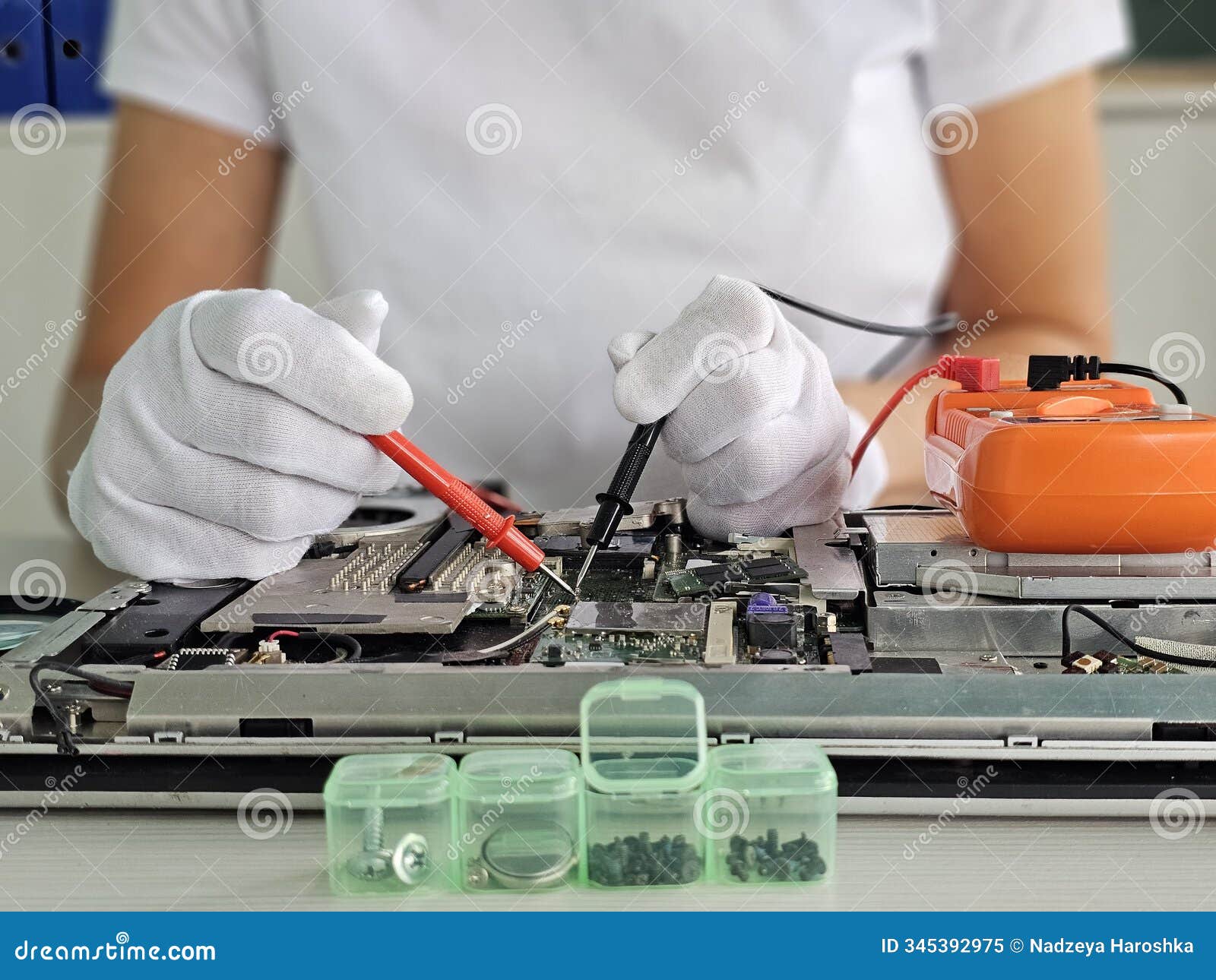 Computer Engineer with Tester Inspects Motherboard Stock Image - Image ...