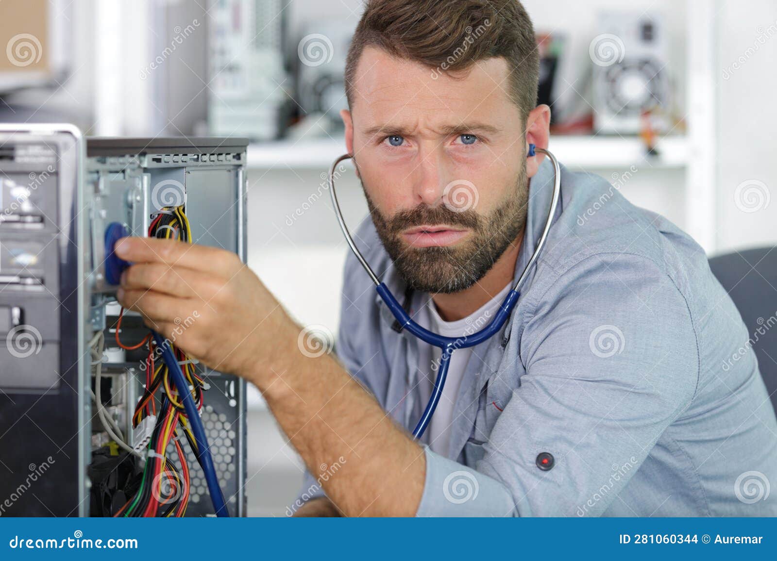 Computer Engineer Working on Broken Console in Office Stock Photo ...