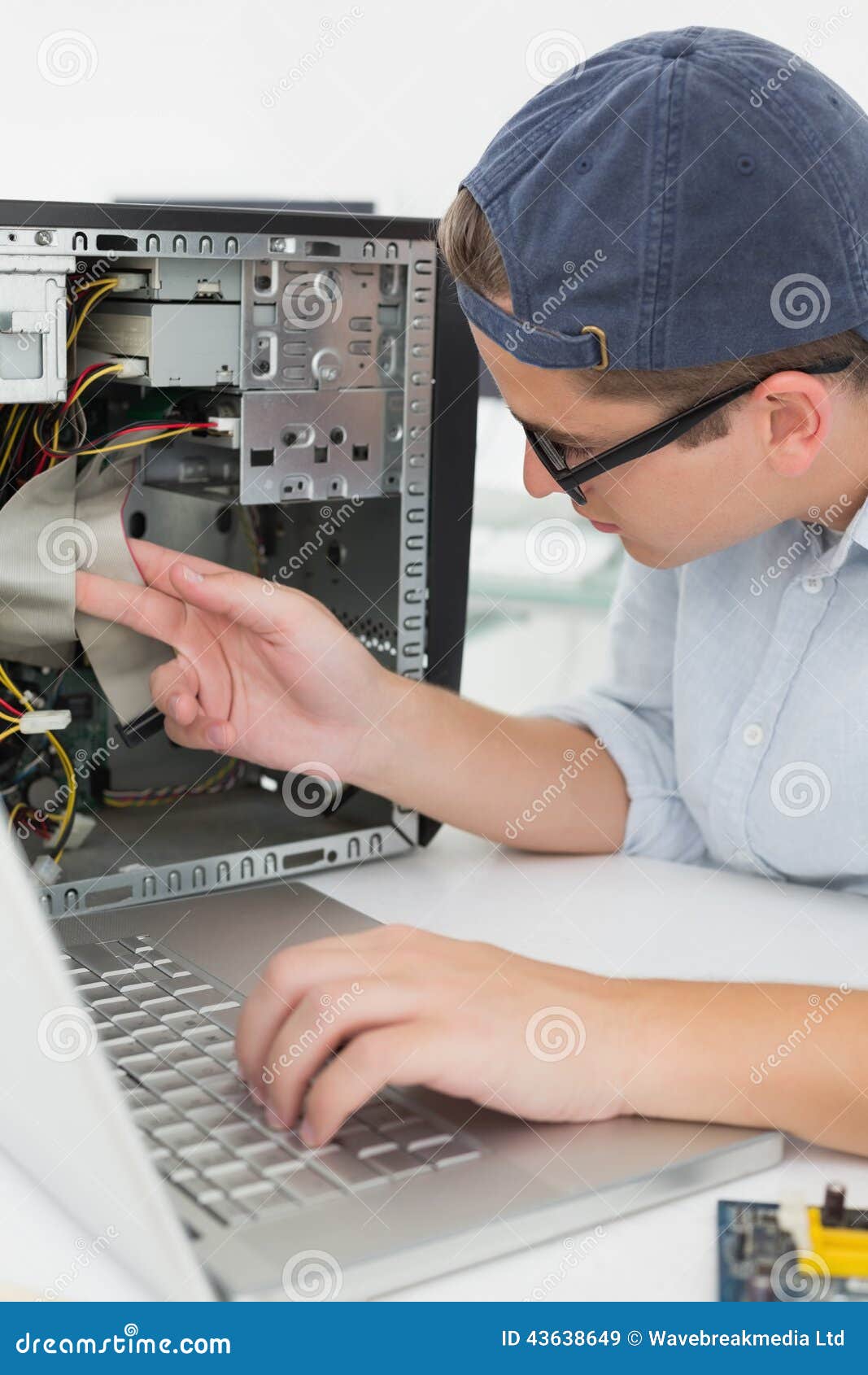 Computer Engineer Working on Broken Console with Laptop Stock Image ...
