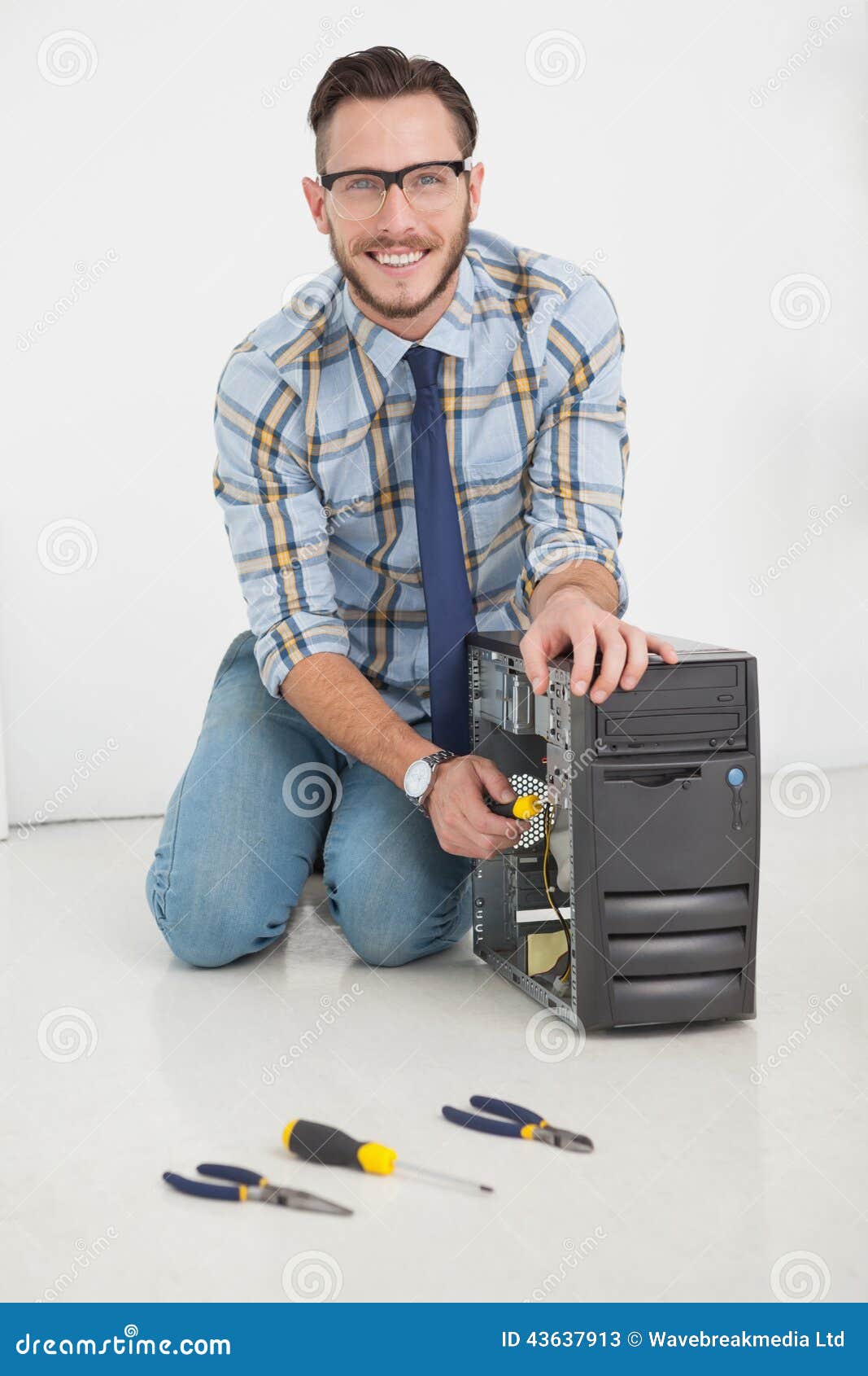 Computer Engineer Working on Broken Console with Screwdriver Stock ...