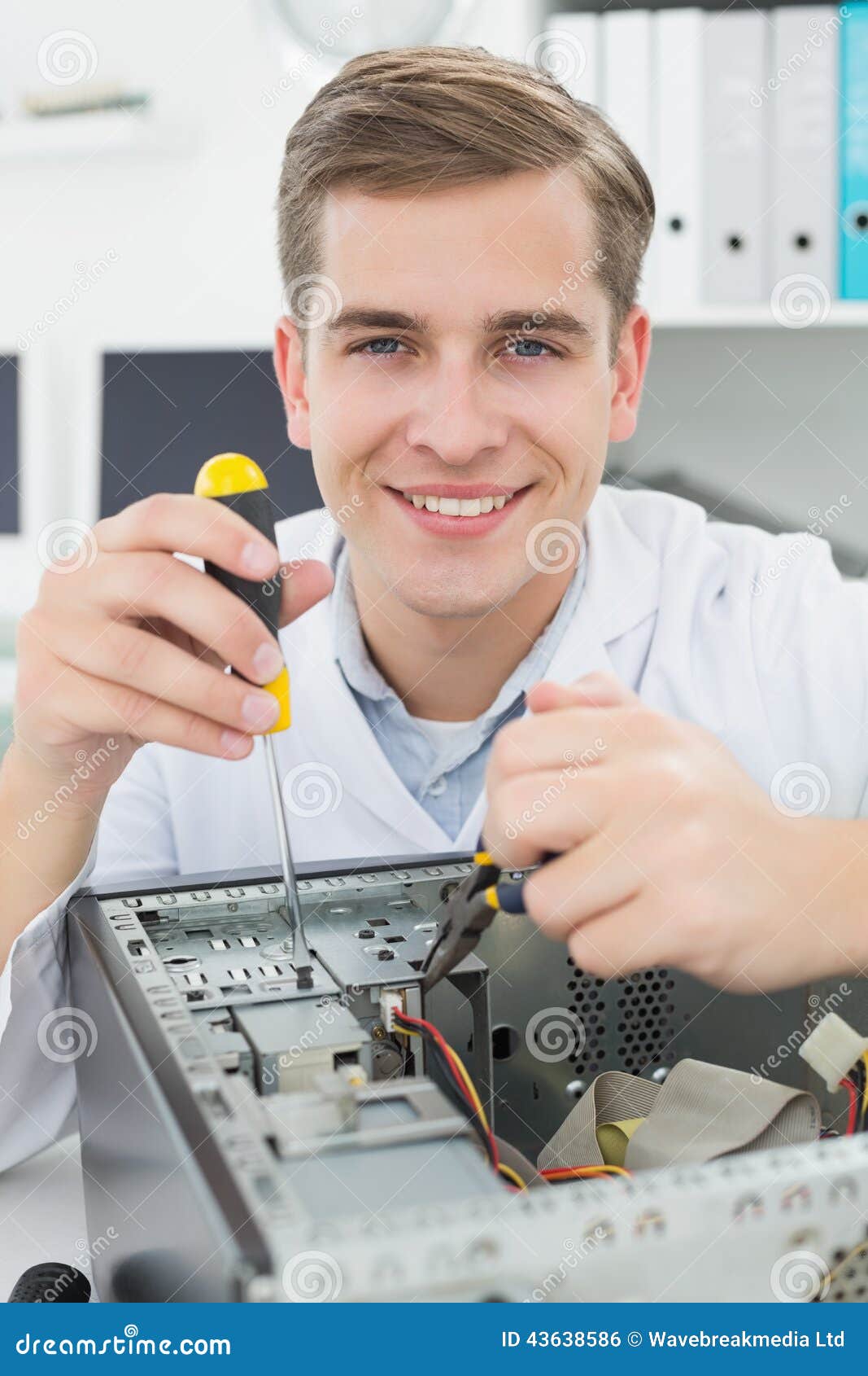 Computer Engineer Working on Broken Device with Screwdriver Stock Photo ...