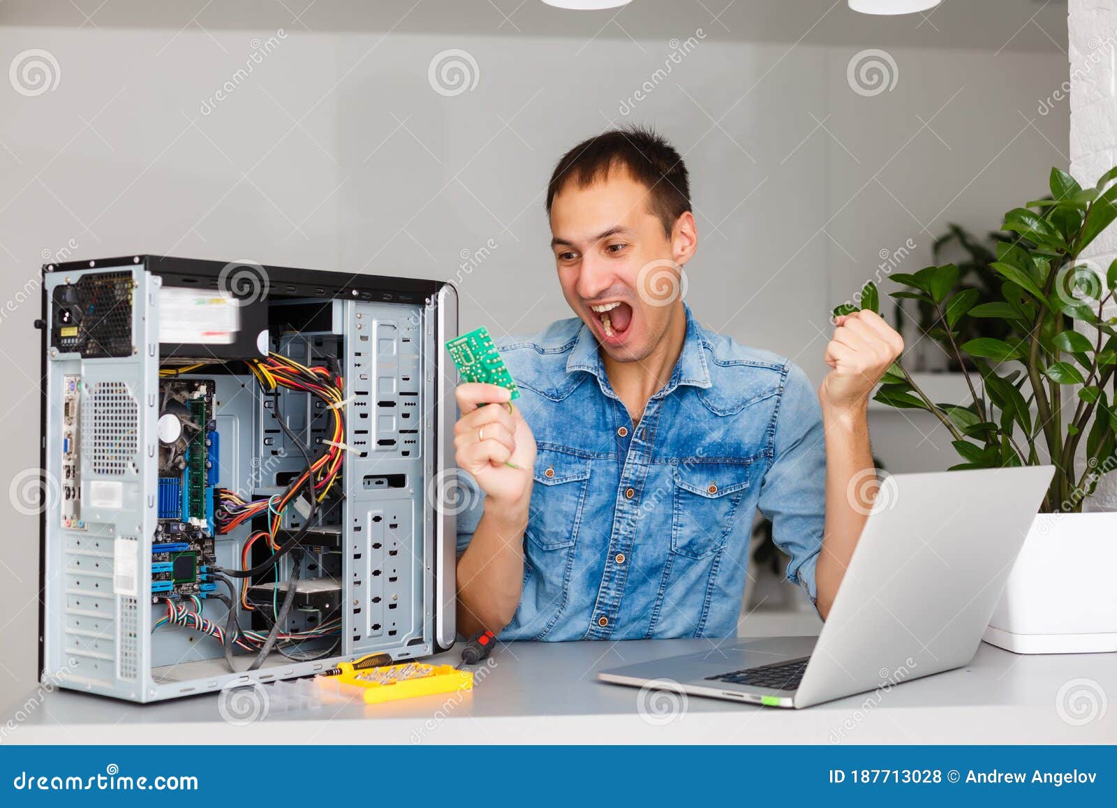 Computer Engineer Working on an Old Motherboard Stock Photo - Image of ...
