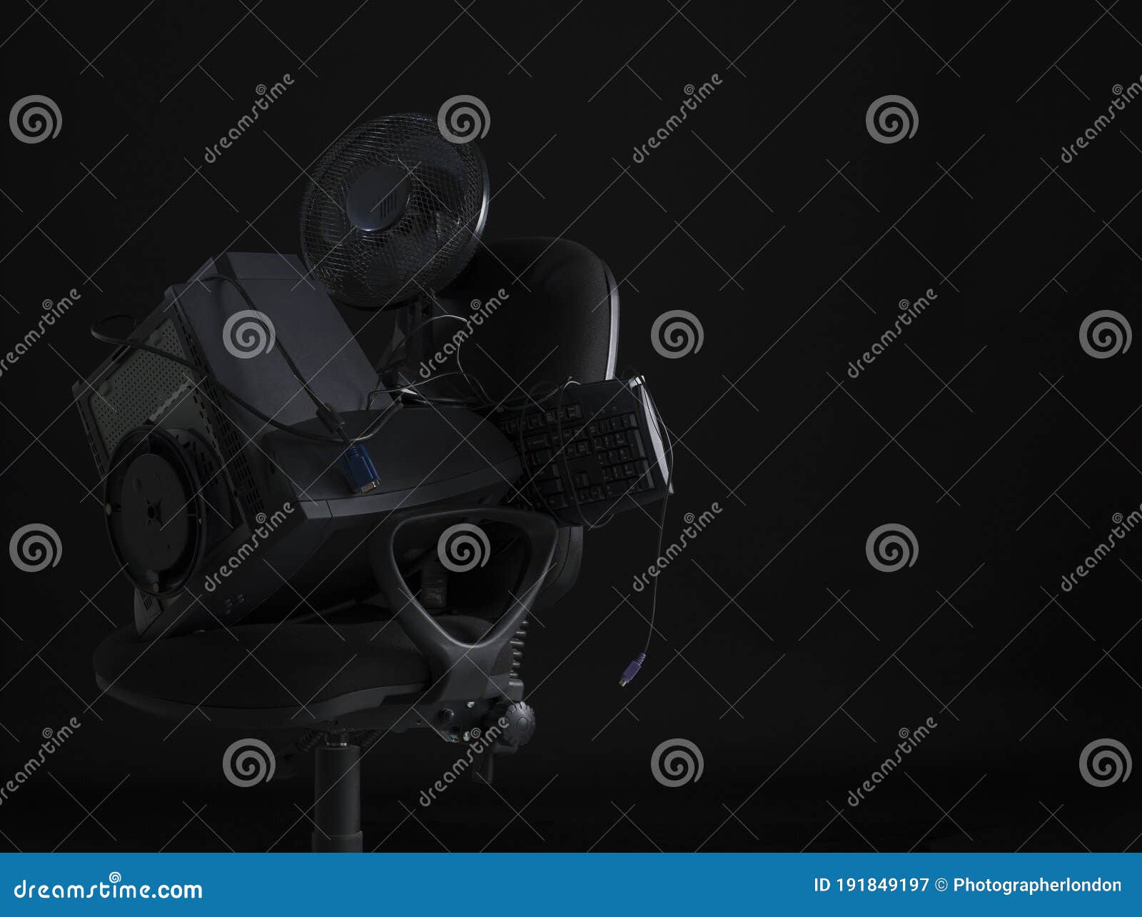 Computer Equipment and Fan on Office Chair Stock Image - Image of black ...