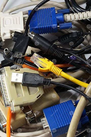 A Tangle of Various Cables and Computer Plugs. Computer Equipment Stock ...