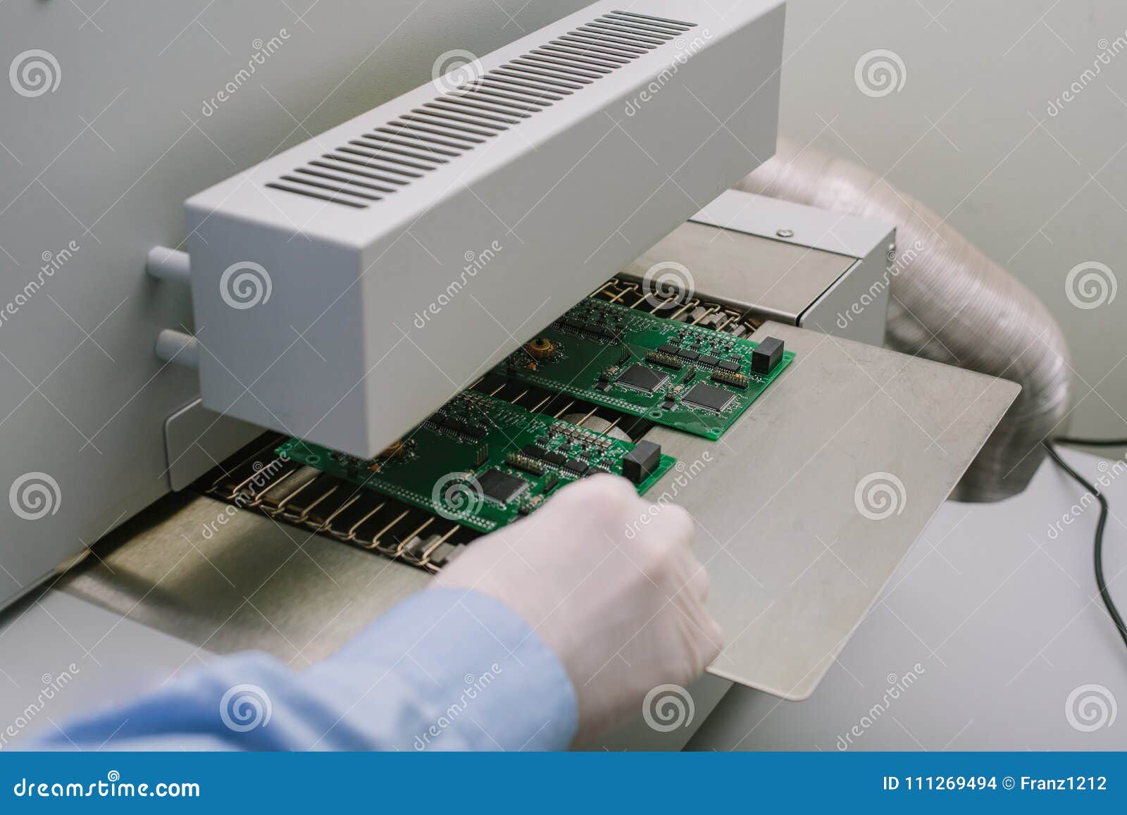 Computer Expert Professional Technician Examining Board Computer in a ...