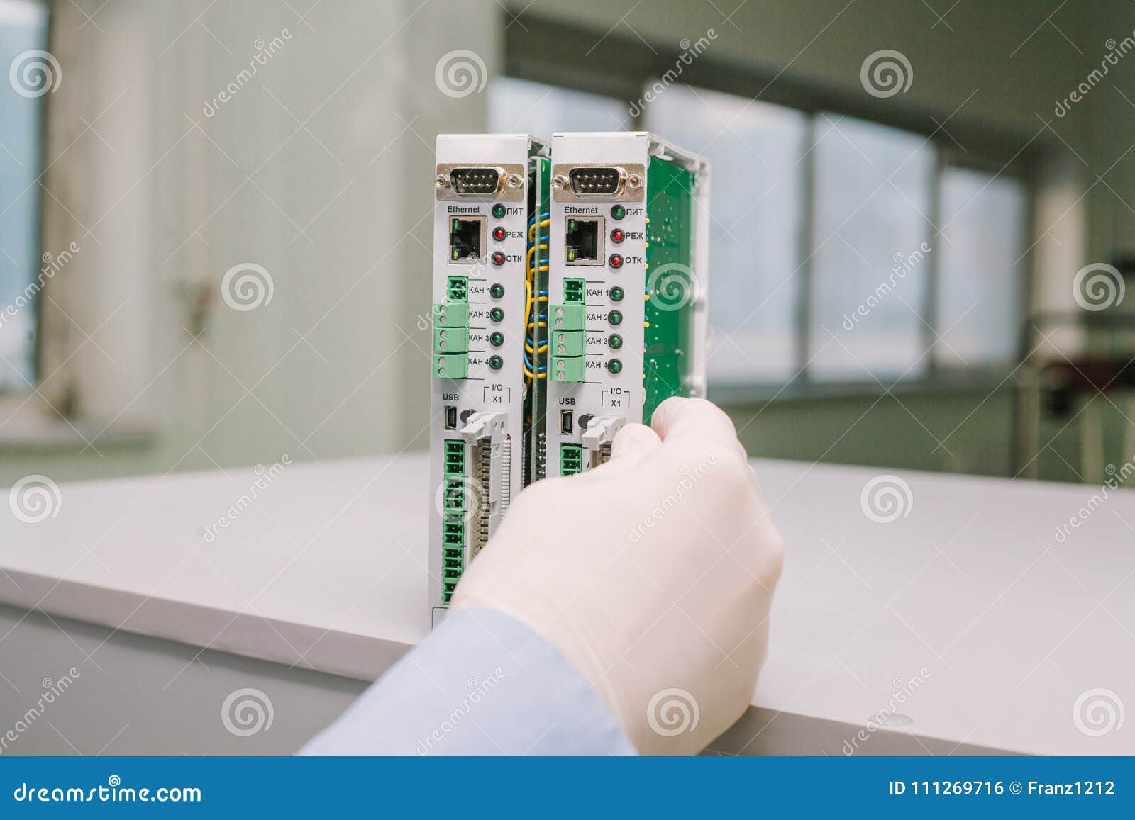 Computer Expert Professional Technician Examining Board Computer in a ...