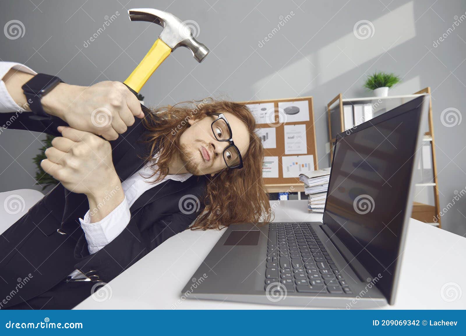 Angry Office Worker Smashing Laptop with Hammer because of Failure or ...