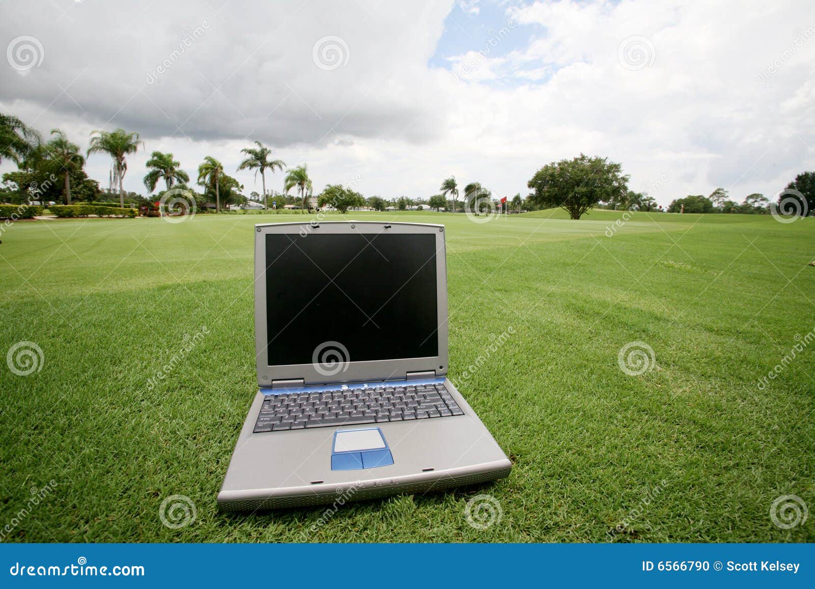 Computer on a golf course stock photo. Image of grass - 6566790