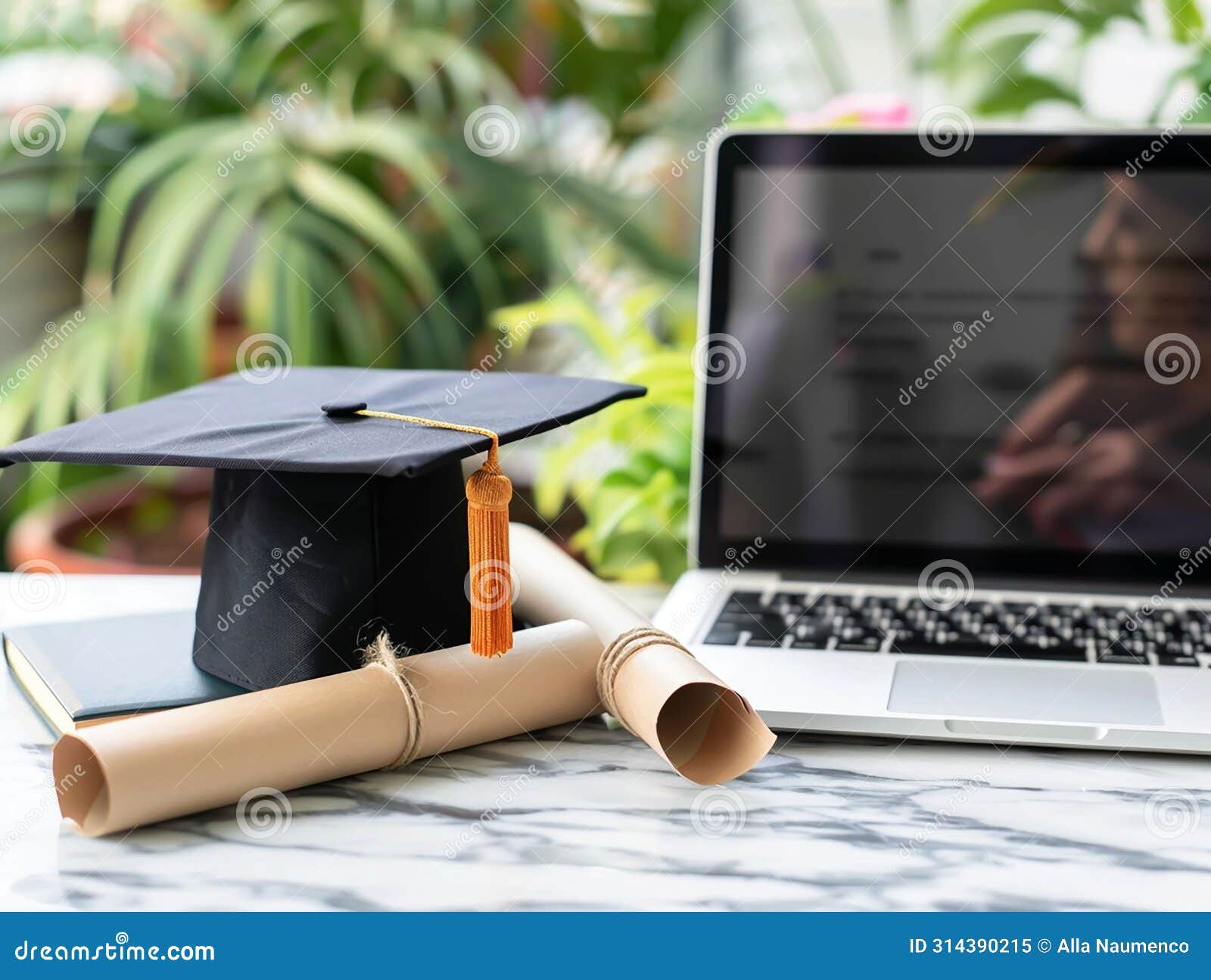 Computer with Graduation Cap and Diploma on Laptop. Copy Space Stock ...