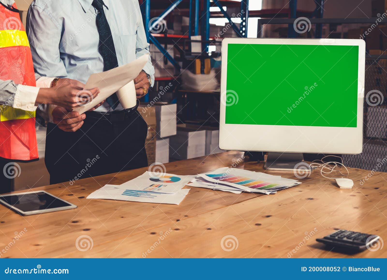 Computer with Green Screen Display in Warehouse Storage Room Stock ...