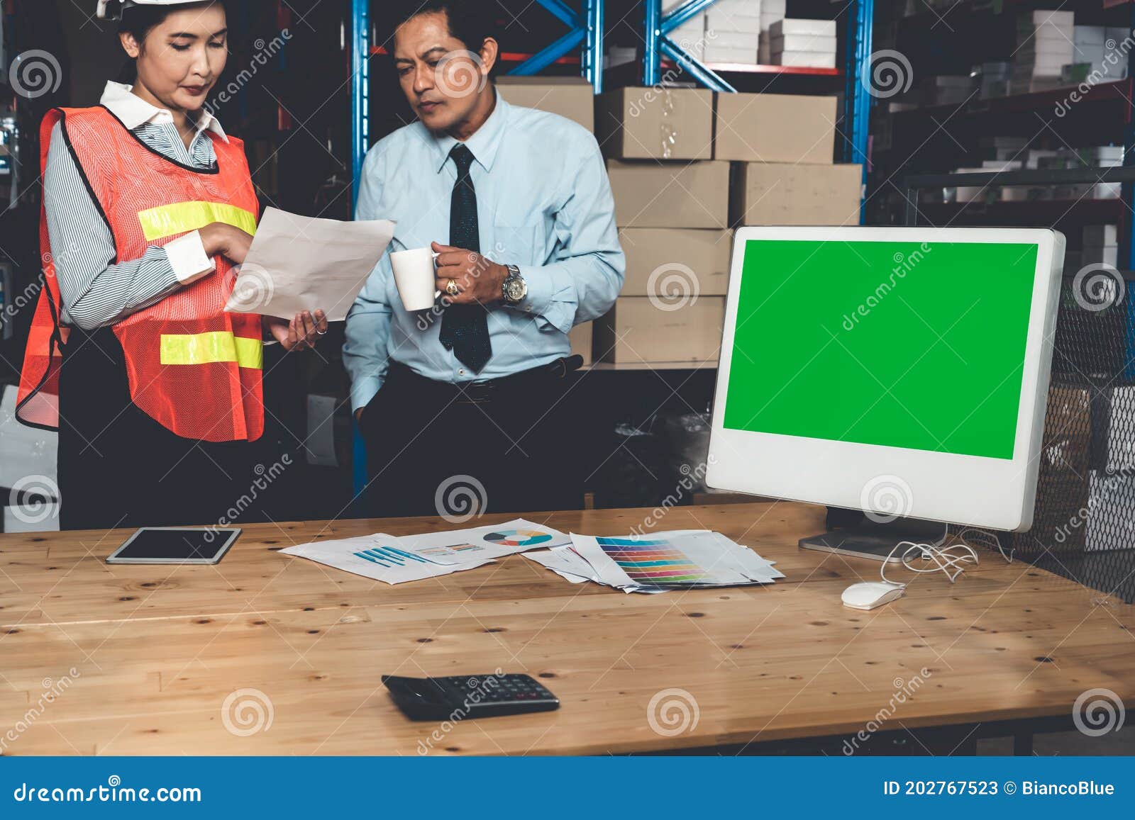 Computer with Green Screen Display in Warehouse Storage Room Stock ...
