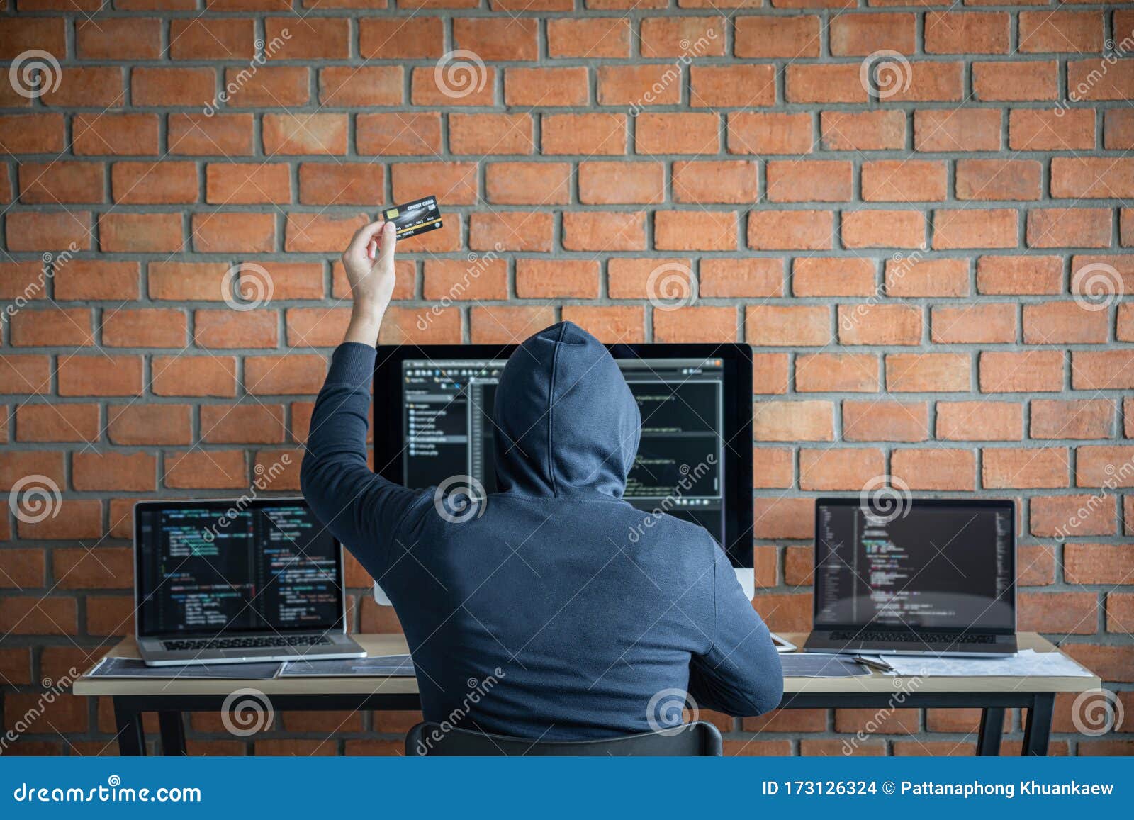 Computer Hacker or Cyber Attack Concept, Dangerous Hooded Hacker Using Multiple Computers Typing ...
