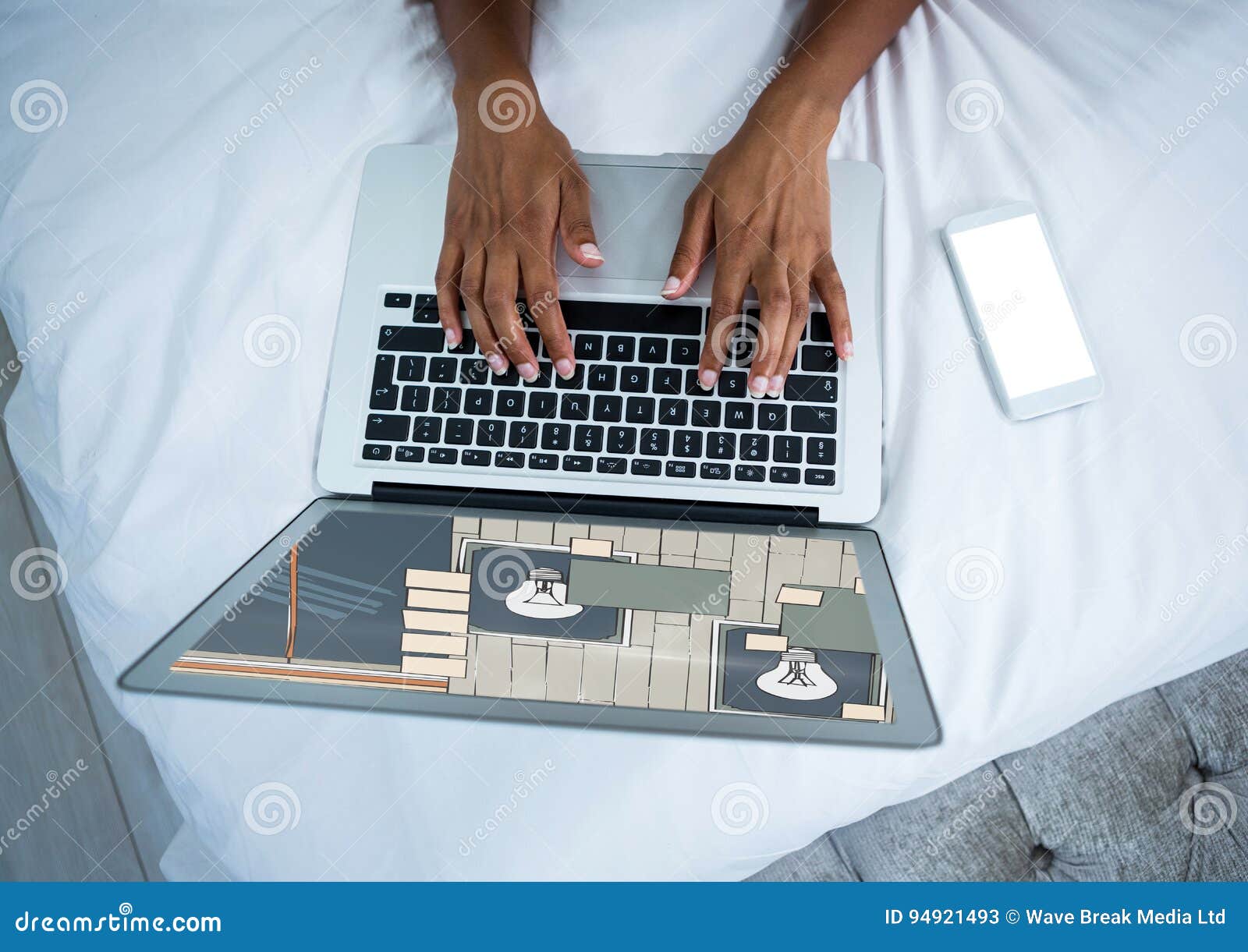 Computer with Hands on Bed. on the Screen the Design for the Wall Stock ...