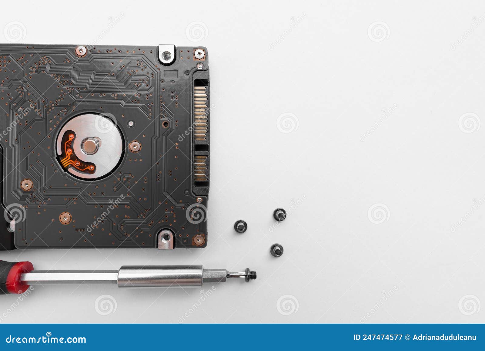 Hard drive and screwdriver stock image. Image of disk - 247474577