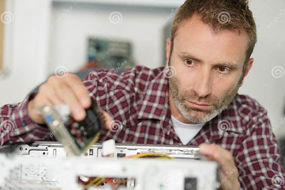 Computer Hardware Engineer Fixing Computer Stock Photo - Image of ...